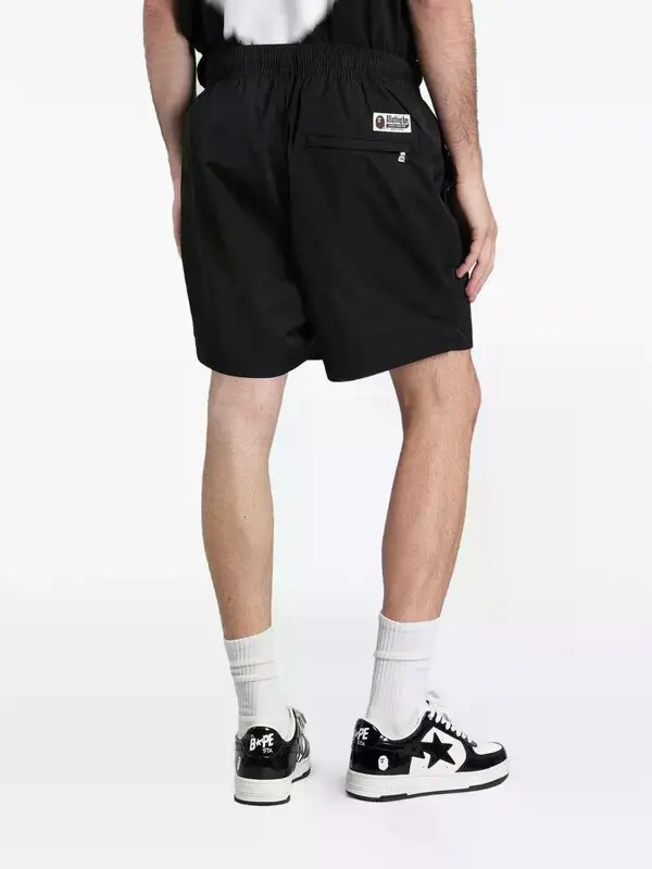 A BATHING APE Ape Head Logo Print Track Shorts