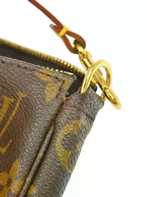 LOUIS VUITTON Monogram Pochette Accessoires Handbag - Brown