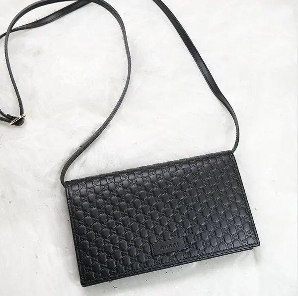 Gucci Monogram Embossed Flap Shoulder Bag