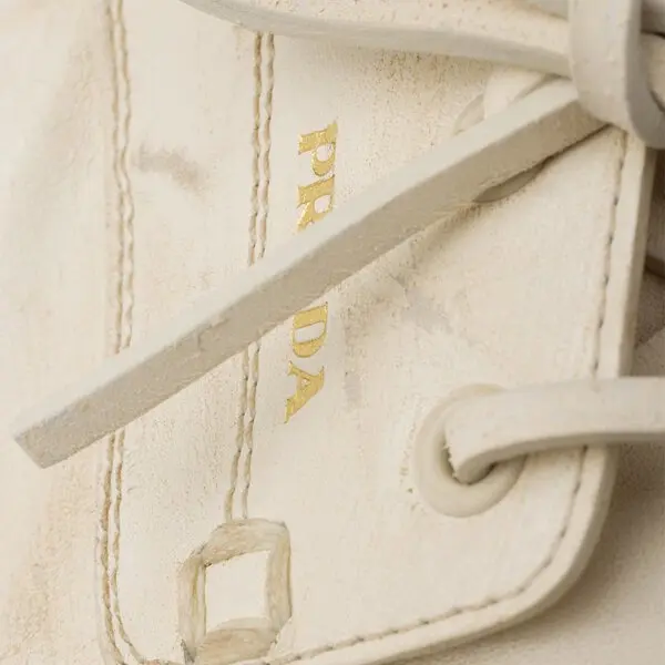 Prada Shuffle Boat Loafers In Antique-effect Leather - White