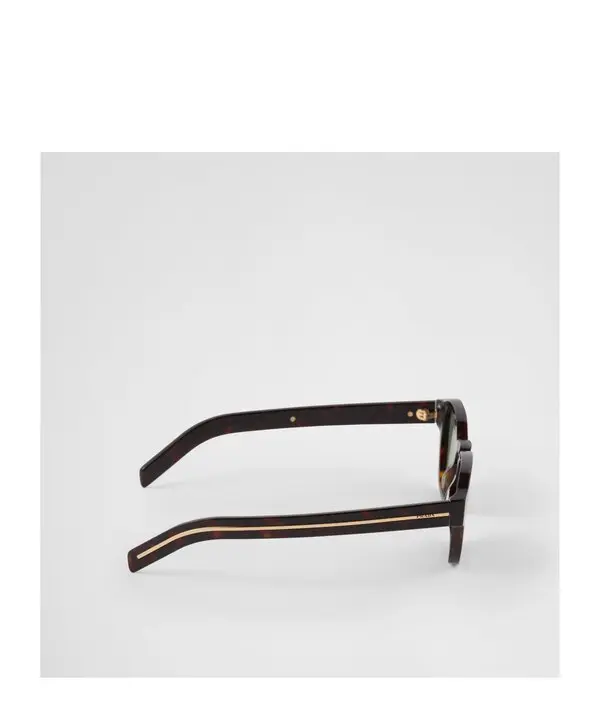 Prada Sunglasses With Iconic Metal Plaque And Triangular Rivets
