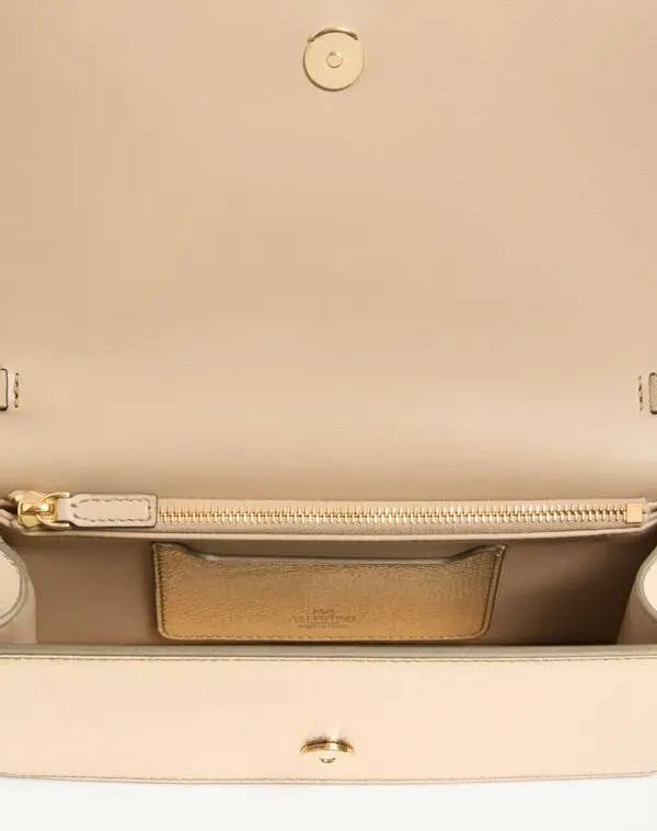Valentino Garavani Vlogo Signature Mini Shoulder Bag In Laminated Grainy Calfskin With Jewel Logo - Gold/crystal