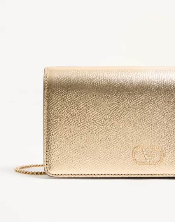 Valentino Garavani Vlogo Signature Mini Shoulder Bag In Laminated Grainy Calfskin With Jewel Logo - Gold/crystal