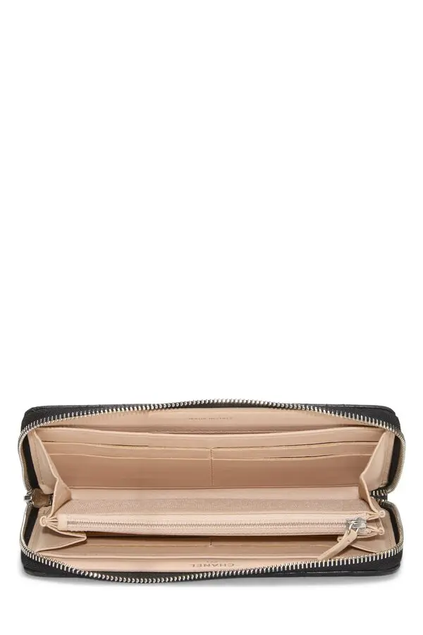 Chanel Embossed Camellia Wallet