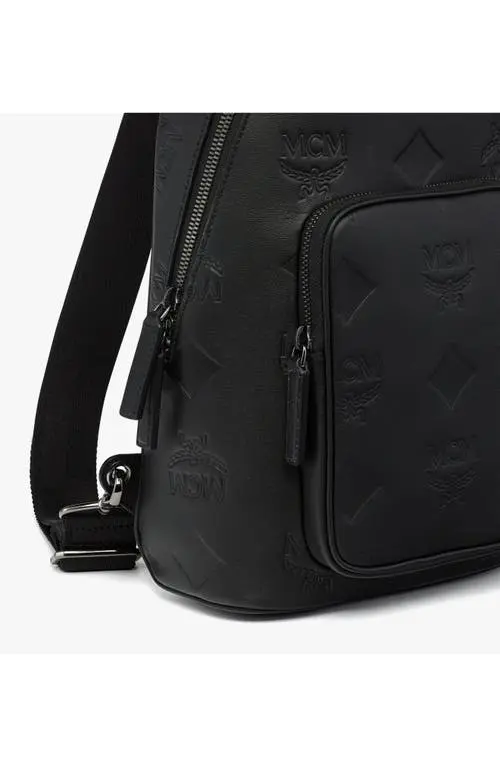 Mcm Embossed Monogram Leather Sling Bag