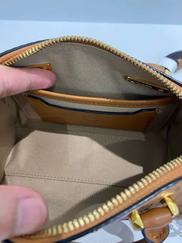 Mcm Monogram Leather Mini Duffle Bag