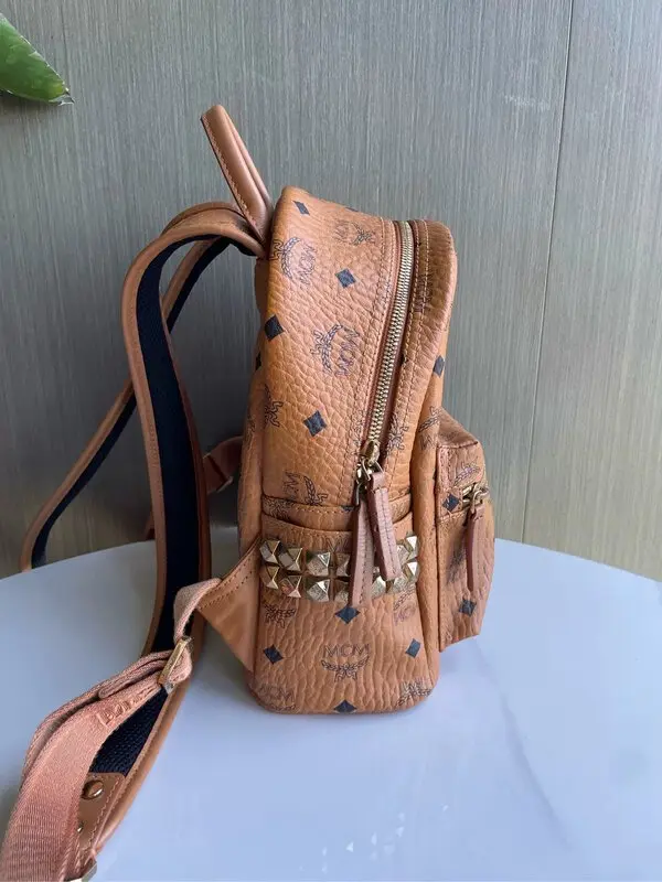 Mcm Leather Studded Monogrammed Backpack