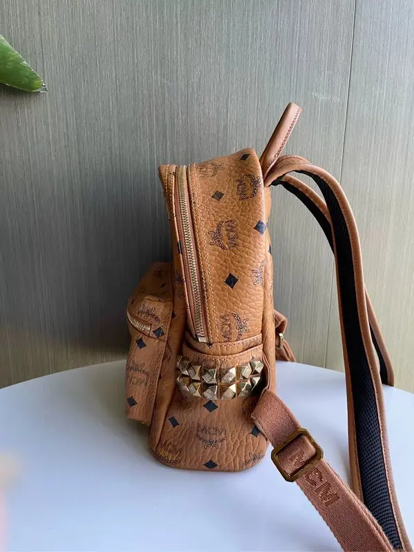 Mcm Leather Studded Monogrammed Backpack
