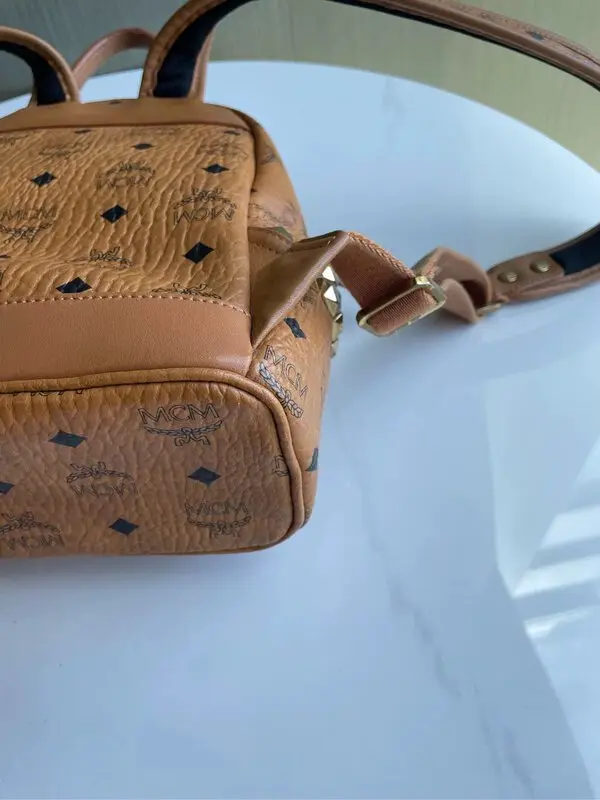 Mcm Leather Studded Monogrammed Backpack