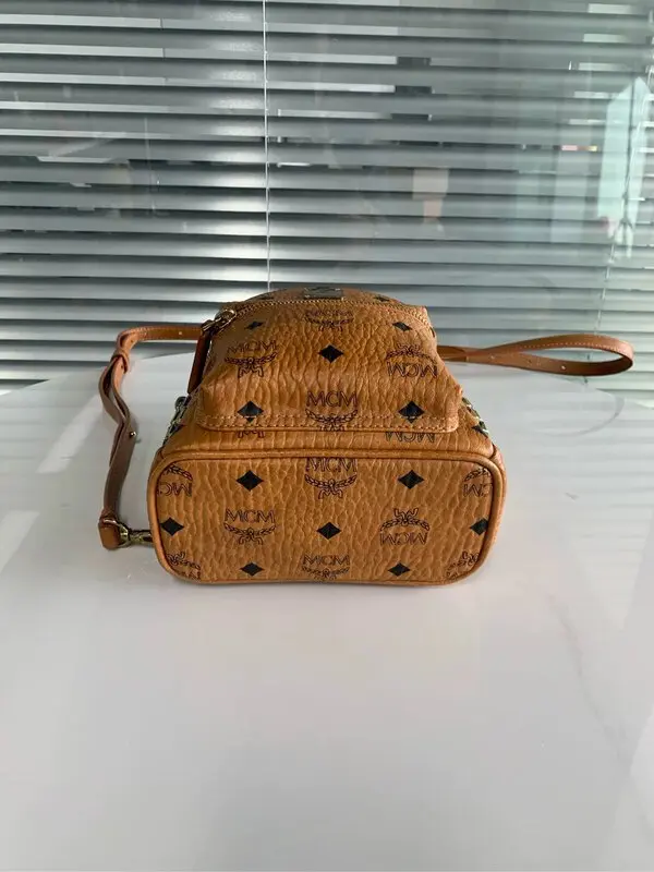 Mcm Leather Monogram Studded Backpack