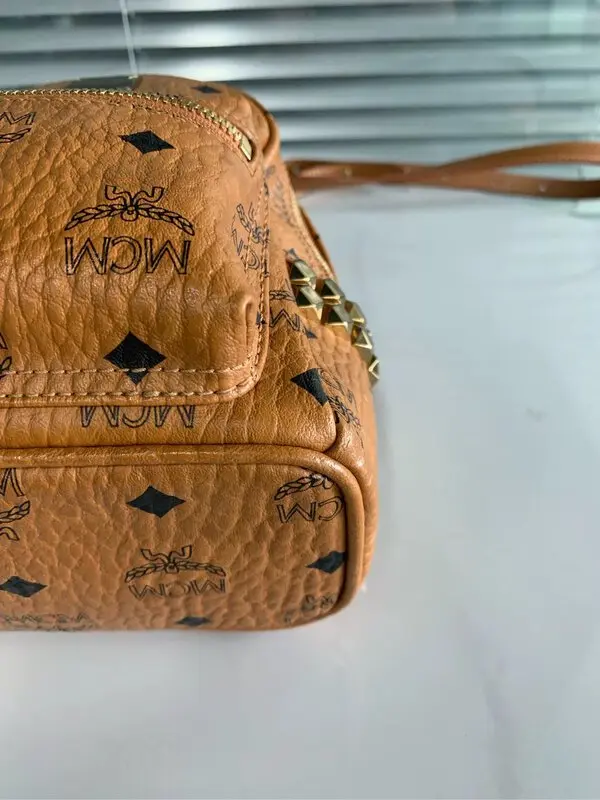 Mcm Leather Monogram Studded Backpack