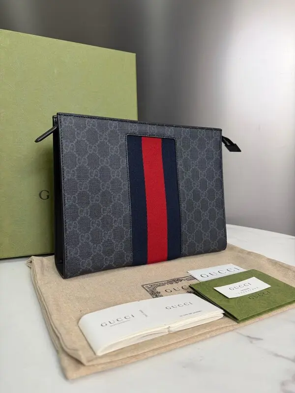 Gucci Monogram Leather Clutch With Stripe Detail
