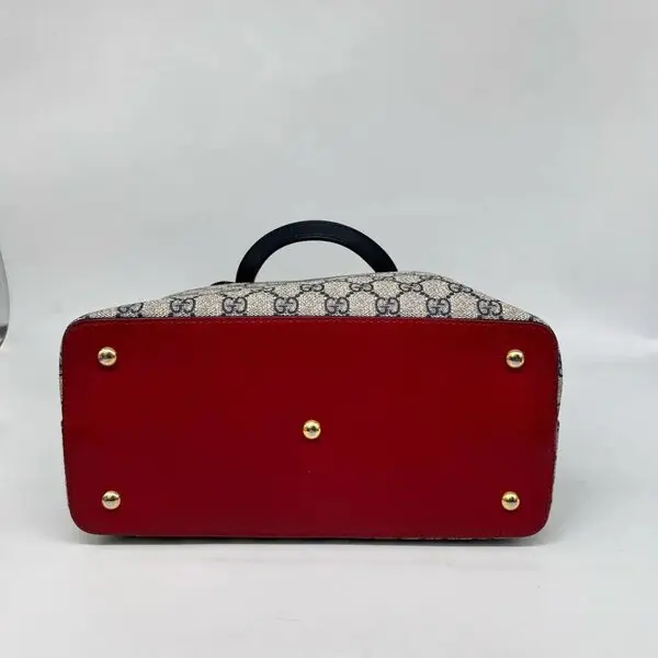 Gucci Monogram Leather Handbag