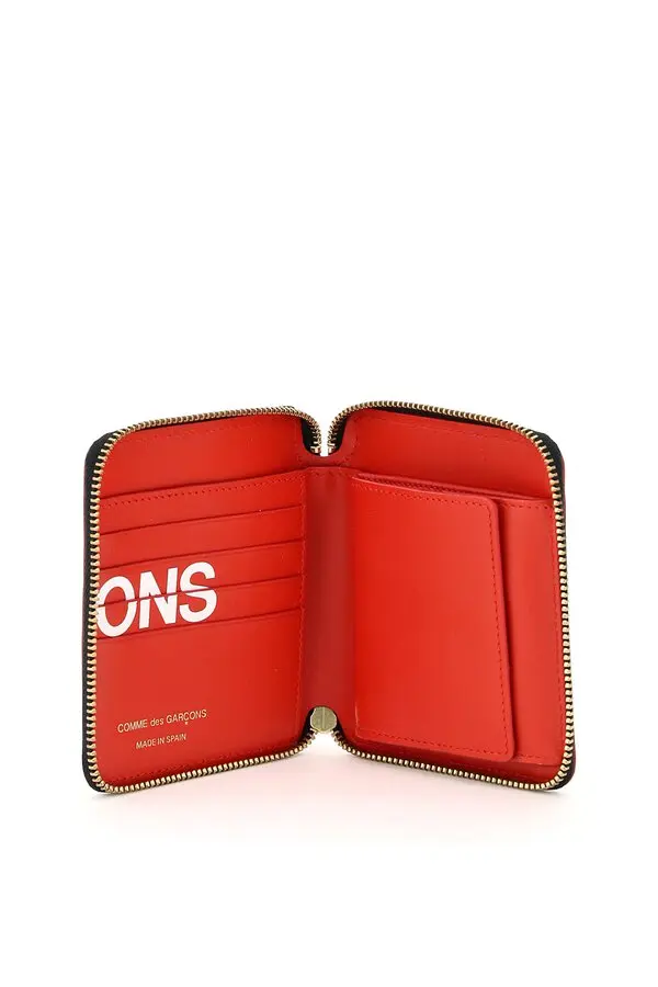 Comme Des Garçons Logo Print Zipped Wallet