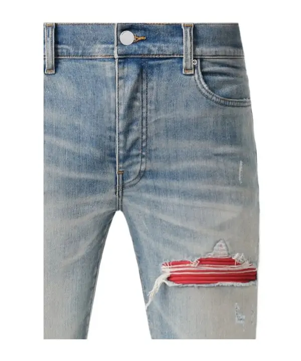 Amiri Jeans With Distressed Detail