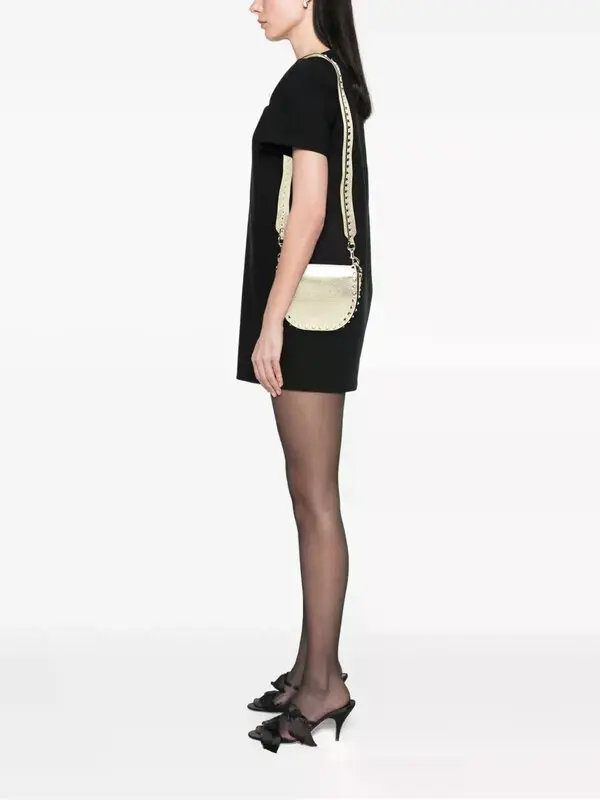 Valentino Garavani Metallic Grained Calfskin Rockstud Saddle Crossbody Bag - Gold
