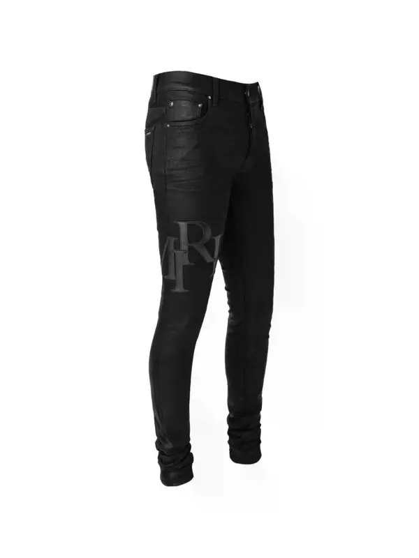 Amiri Waxed Staggered Logo Jeans