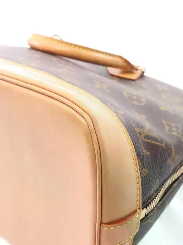 LOUIS VUITTON Monogram Alma Pm Handbag