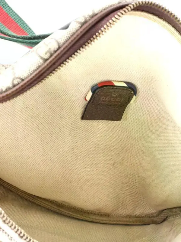 Gucci Gg Coated Canvas Belt Bag With Applique