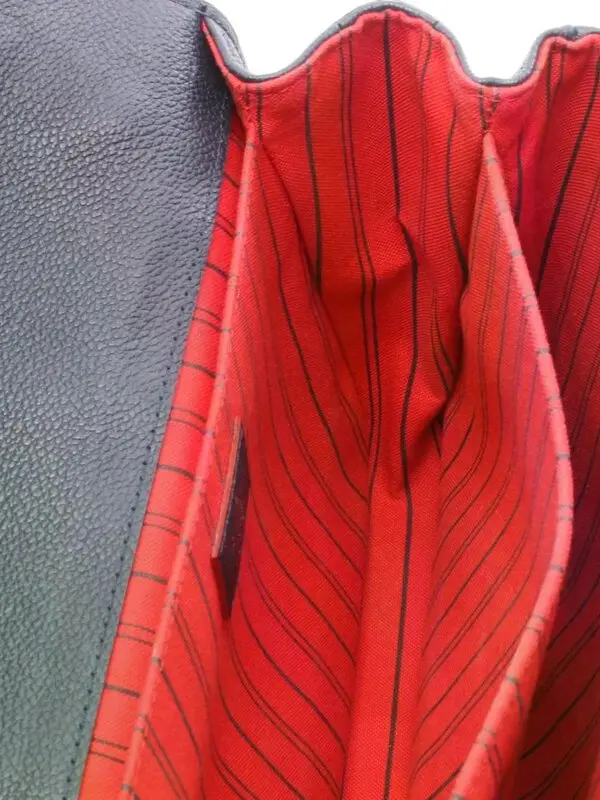 LOUIS VUITTON Monogram Empreinte Pochette Metis Handbag