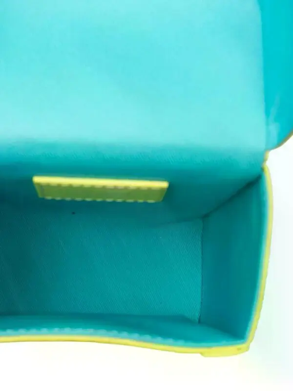 LOUIS VUITTON Monogram Taurillon Vertical Trunk Wearable Wallet Crossbody Bag - Yellow