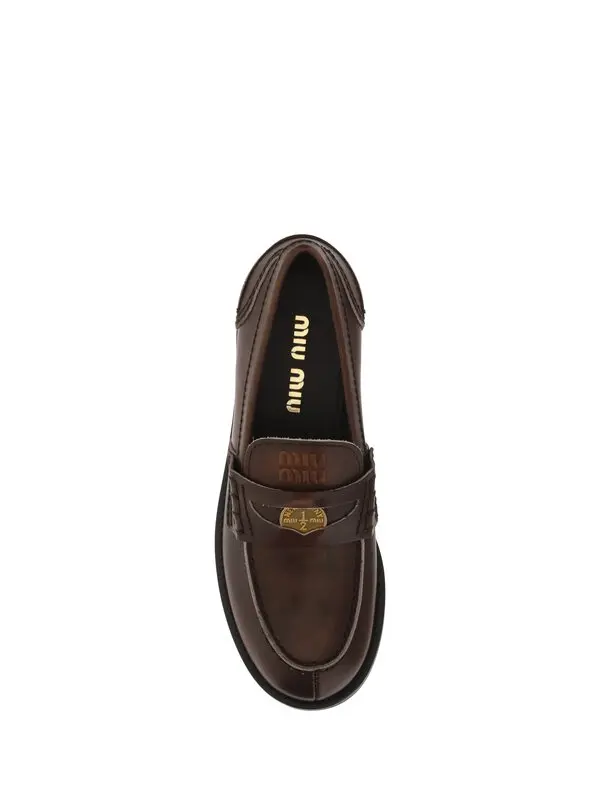 Miu Miu Leather Loafers With Raised Logo Detail - Brown