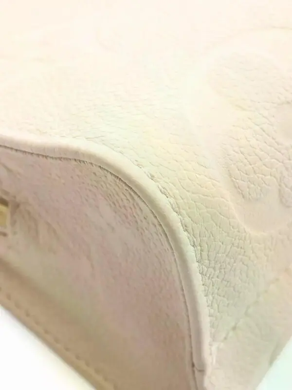 LOUIS VUITTON Monogram Empreinte On-the-go Ew Handbag - Neutrals