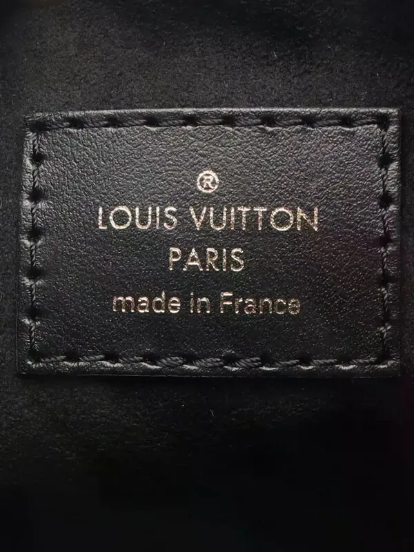 LOUIS VUITTON Monogram Kanoe Handbag