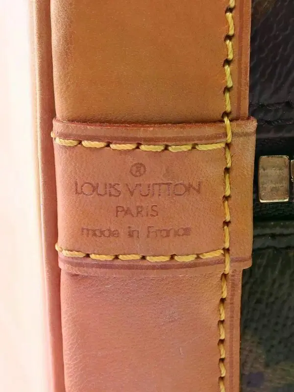 LOUIS VUITTON Alma Monogram Tote Bag