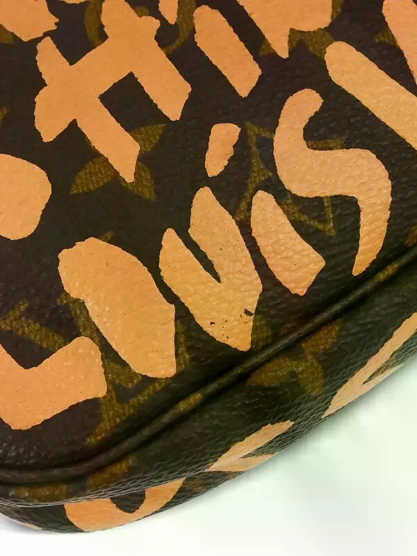 LOUIS VUITTON Graffiti Pochette Accessoires Handbag