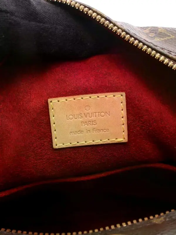 LOUIS VUITTON Monogram Excentri Cite Handbag