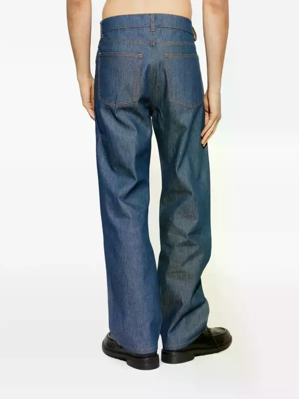 Moschino Tapered-leg Jeans With Logo Patch