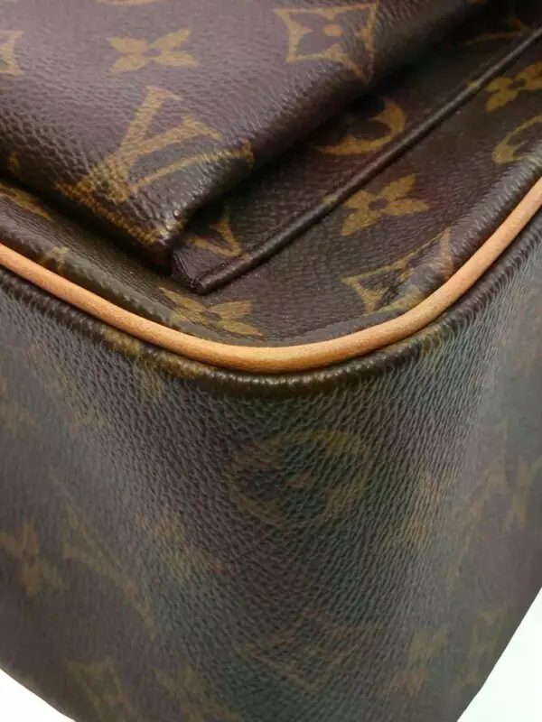LOUIS VUITTON Monogram Excentri Cite Handbag