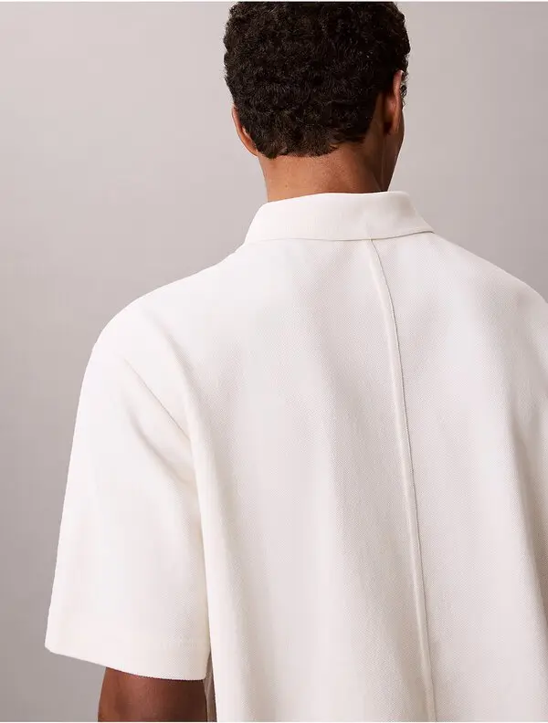 Calvin Klein Script Logo Graphic Pique Relaxed Polo Shirt - Tofu