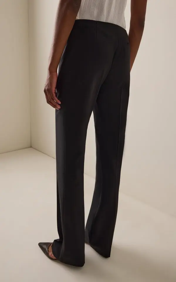 THE ROW Fabien Low-rise Stretch-wool Flared Pants