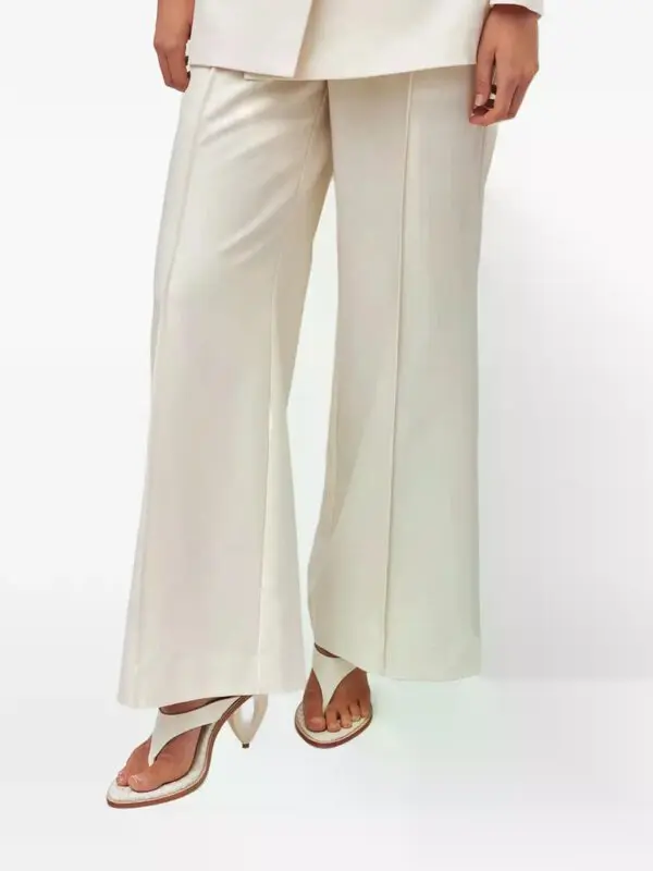Aje Vortex Pressed-crease Trousers