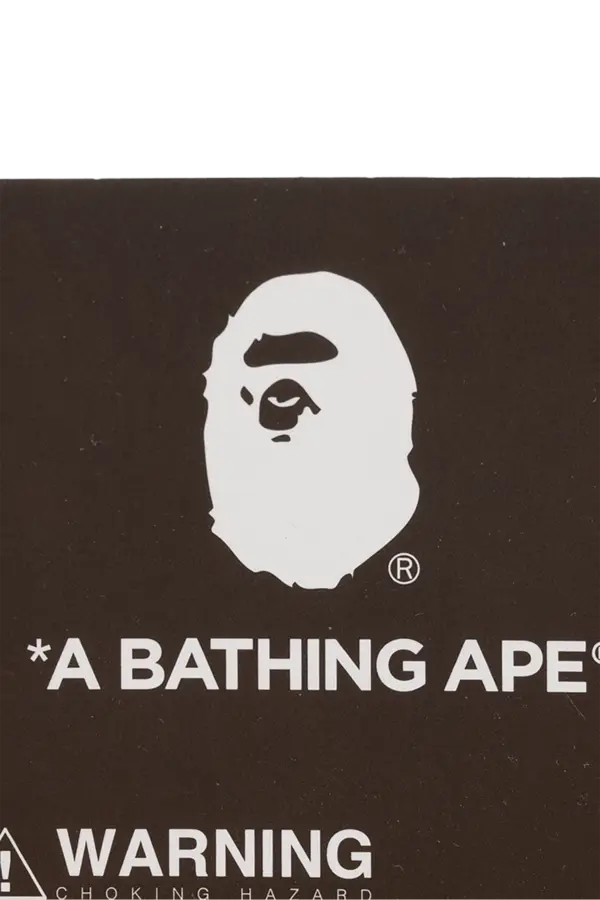 A BATHING APE Keychain With A Monkey Motif