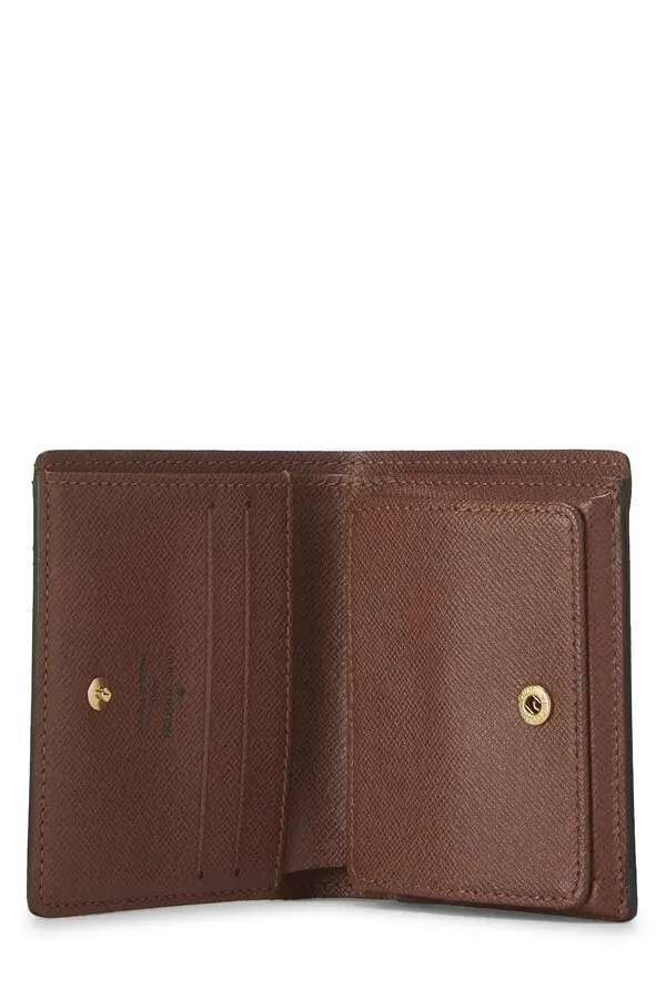 LOUIS VUITTON Monogram Canvas Magellan Wallet