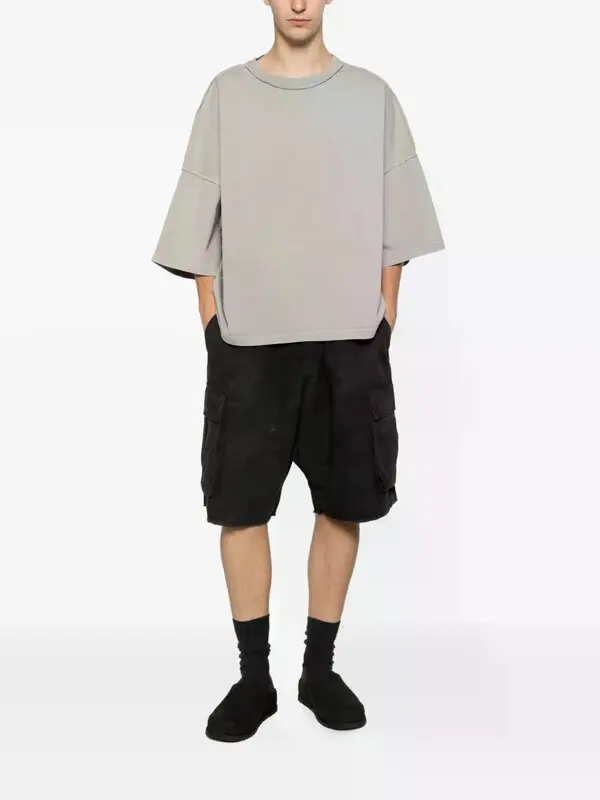 STAY HUMAN ON EARTH Camouflage Print Cargo Shorts