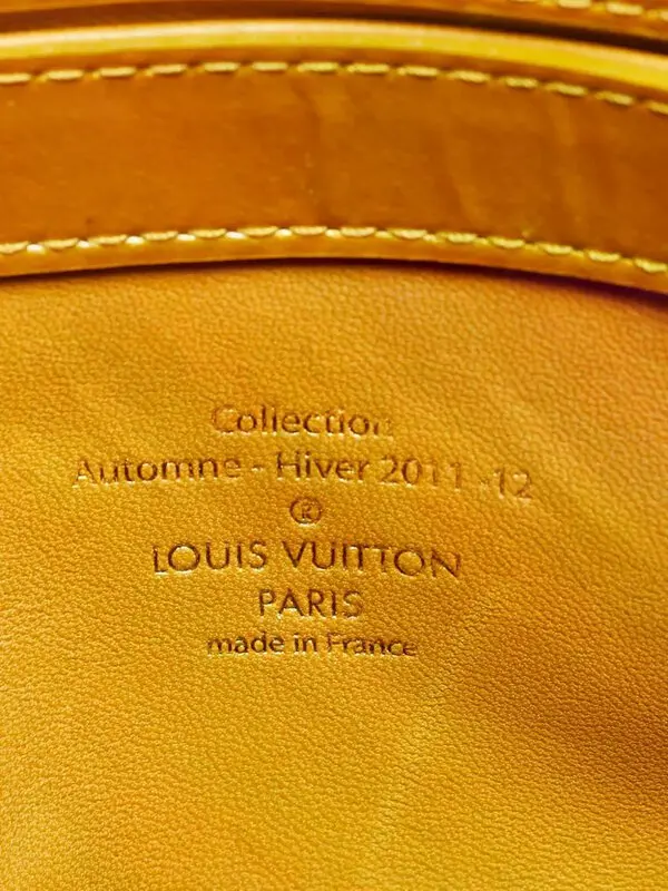 LOUIS VUITTON Lock It Monogram Fascination Tote Bag
