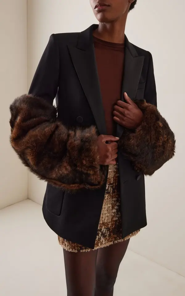 Saint Laurent Long Shearling Muffs With Silk Lining