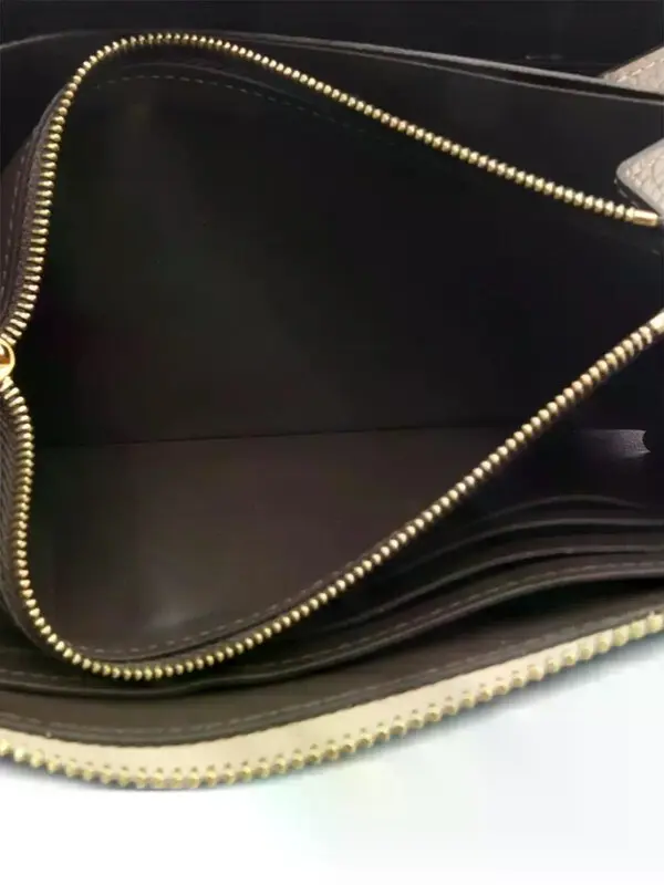 LOUIS VUITTON Comete Taurillon Leather Wallet