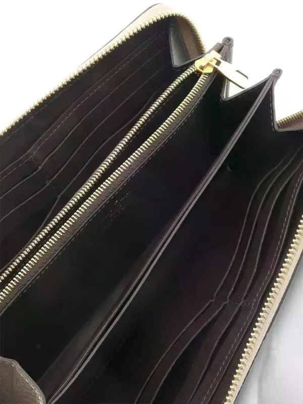 LOUIS VUITTON Comete Taurillon Leather Wallet