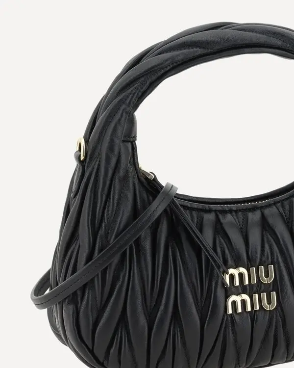 Miu Miu Quilted Leather Hobo Bag - Black