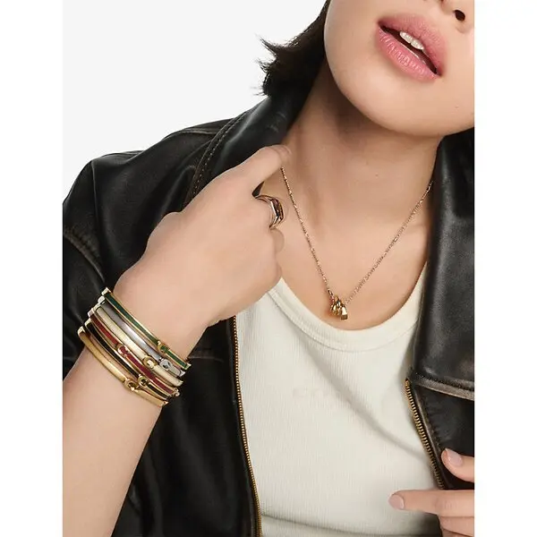 COACH Thin Enamel Signature Hinged Gold-plated Brass Bangle