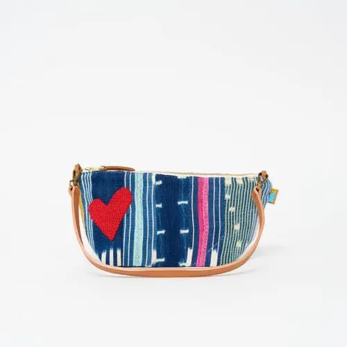 UBUNTU LIFE Convertible Pouch In African Baule Cloth With Beaded Heart Detail