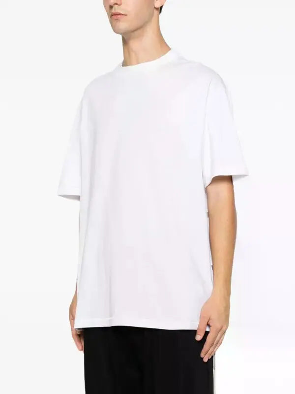STATE OF ORDER Tika Camouflage-appliqué T-shirt