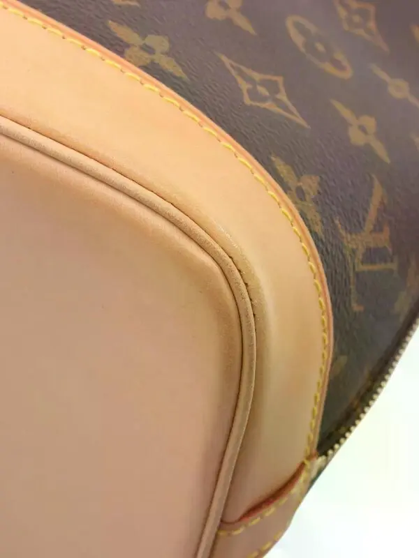 LOUIS VUITTON Monogram Alma Pm Handbag
