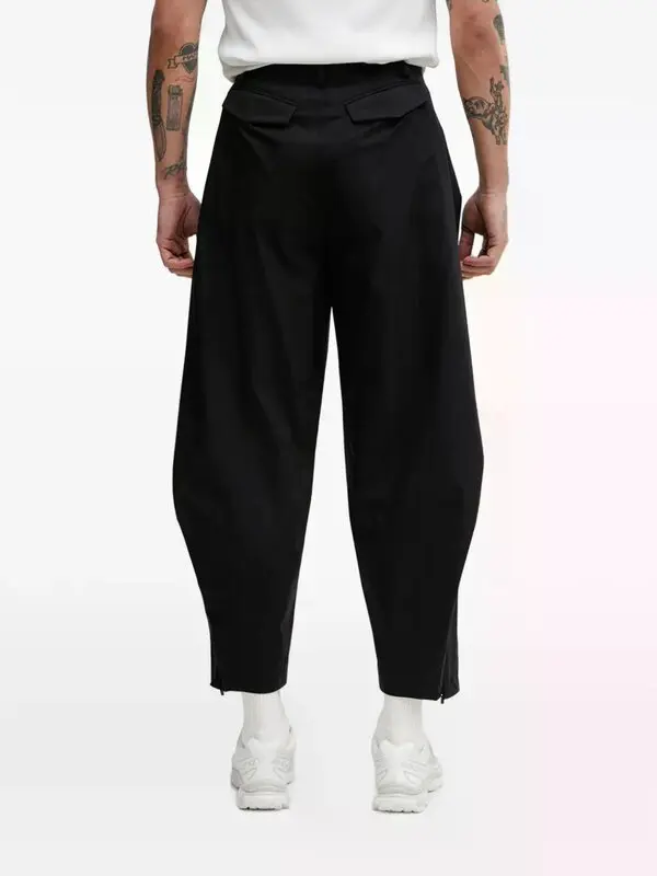 ADER ERROR Pleated Tapered-leg Trousers