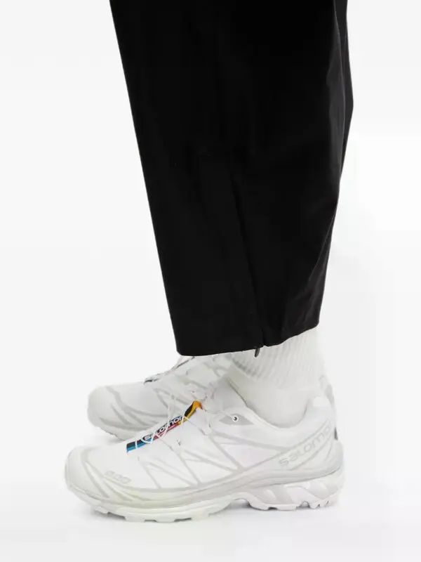 ADER ERROR Pleated Tapered-leg Trousers